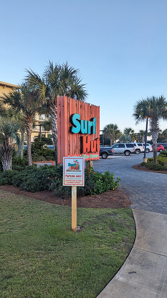 The roadside beacon that signals to hungry travelers: "Your search for authentic Gulf seafood ends here." Follow the turquoise letters.