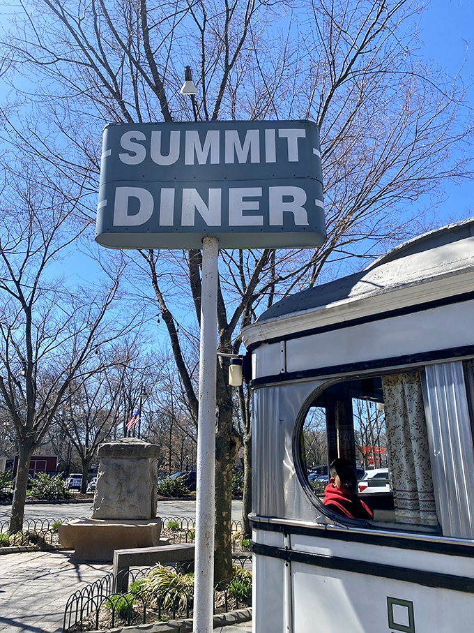 The Summit Diner sign against a blue sky&mdash;a beacon of hope for the hungry and a landmark that's guided generations to great meals.