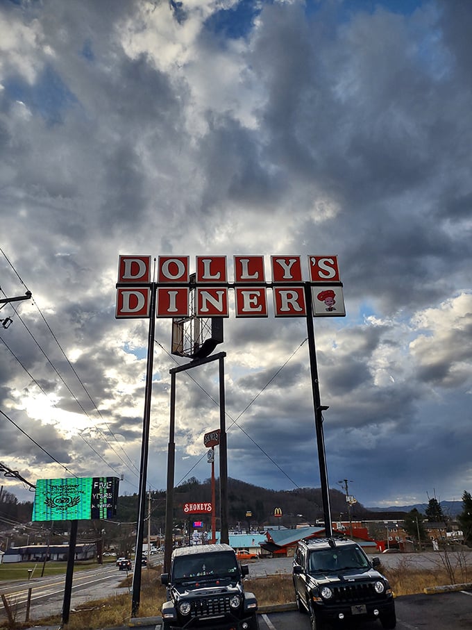 That towering roadside sign stands like a beacon against the West Virginia sky, guiding hungry travelers to their delicious destiny since before GPS was a twinkle in technology's eye.