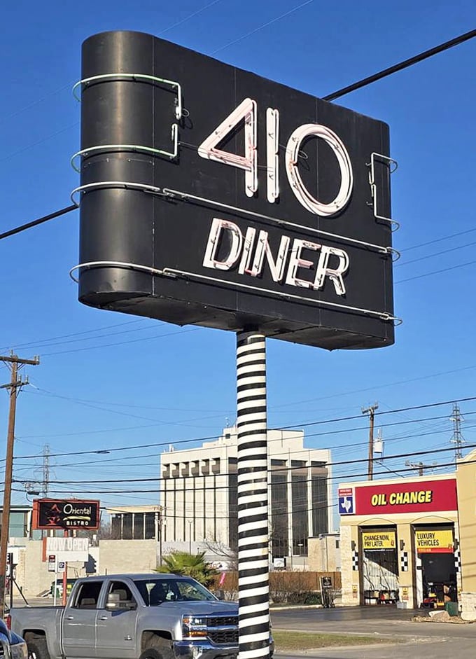 That iconic sign stands as a beacon for hungry travelers and locals alike &ndash; no fancy fonts or pretension, just the promise of honest food.