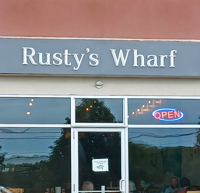 The sign shines like a beacon for seafood lovers. Rusty's Wharf might be landlocked in Ohio, but its spirit belongs to the coast.