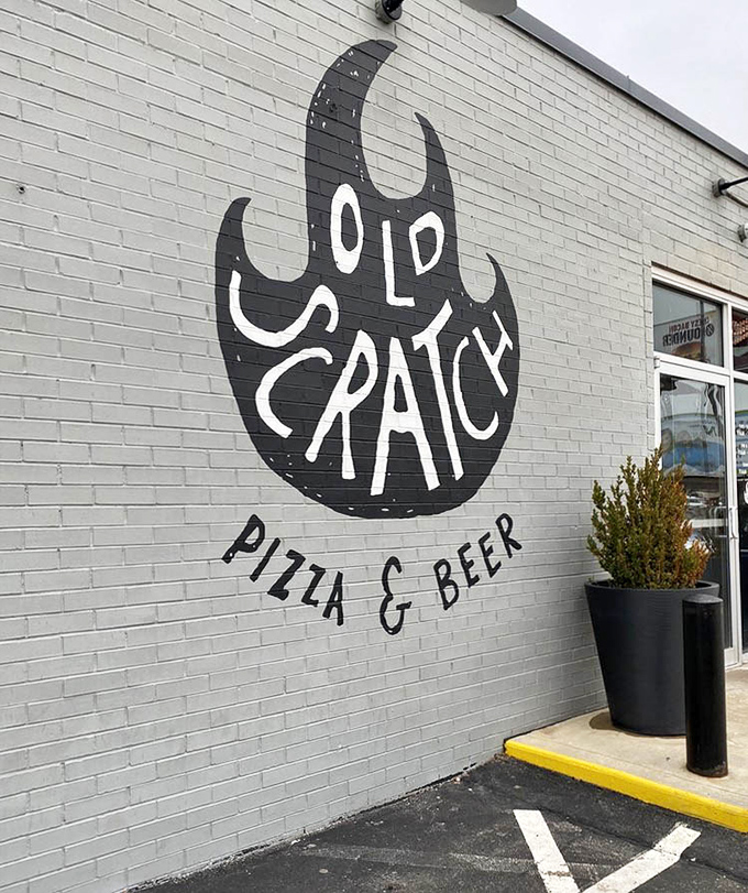 The iconic flame logo emblazoned on the building's exterior&mdash;a beacon for hungry souls seeking pizza salvation in Dayton's urban landscape.