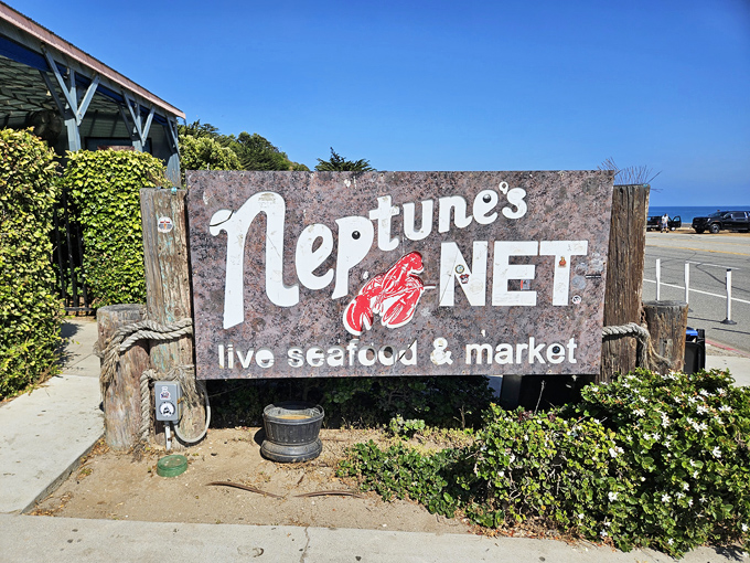 The sign that's launched a thousand road trips. Half seafood promise, half California landmark.