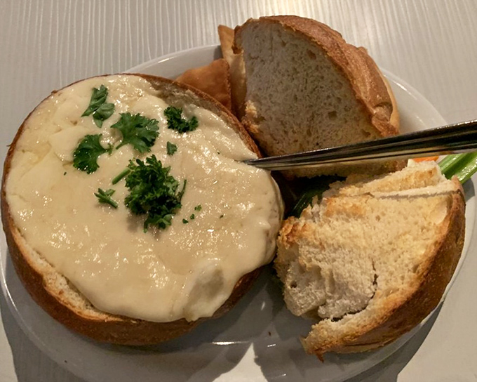 Vampire Dip that's worth risking garlic breath for – a bubbling cauldron of cheese with bread standing by, ready for its delicious sacrifice.