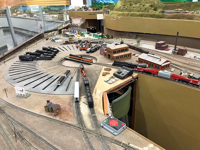 Each miniature building tells a story, complete with period-appropriate signage and architectural details that astound.