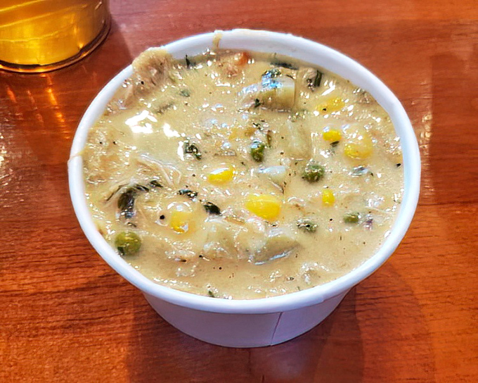 Creamy chicken chowder loaded with vegetables &ndash; comfort in a cup. The perfect starter before diving into smoky main attractions.