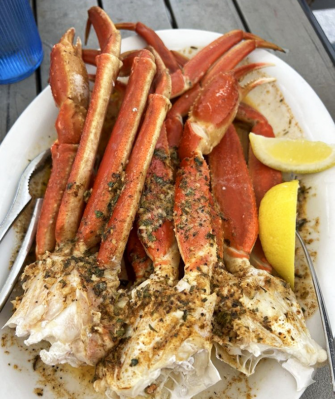 Snow crab legs arranged like nature's perfect eating utensils&mdash;just crack, dip in that melted butter, and prepare for sweet oceanic bliss.