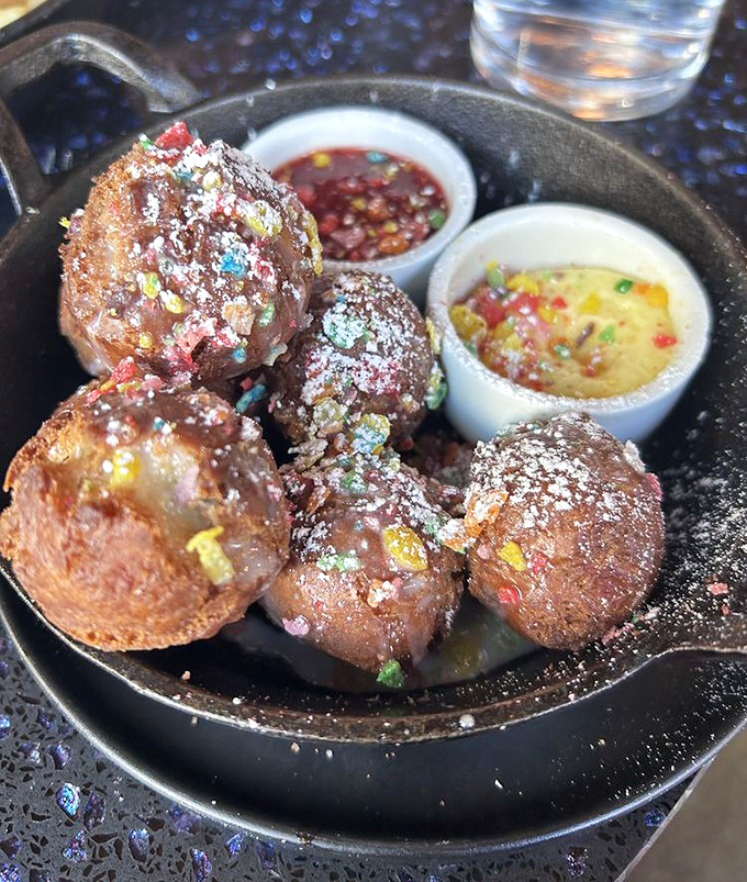 "Spaceballs" that would make Mel Brooks proud. These sweet, sprinkle-dusted spheres of joy come with dipping sauces for extra intergalactic flavor.