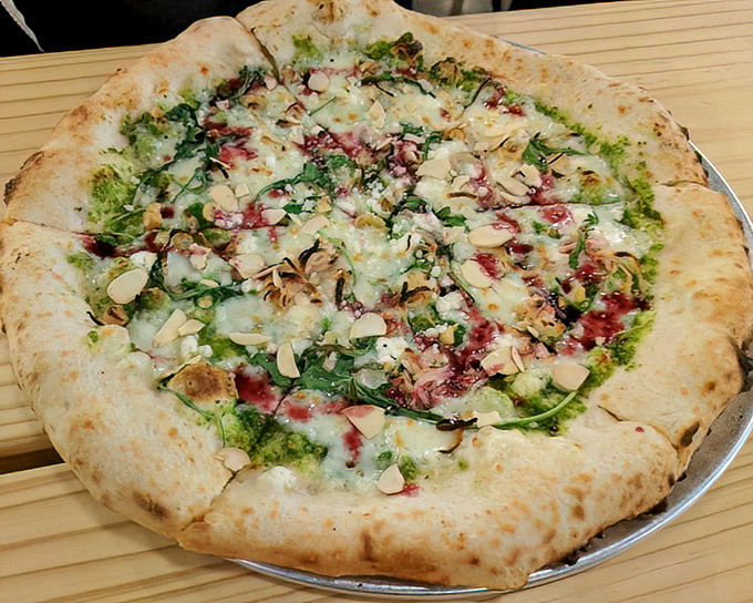 Green meets white meets red in this pizza masterpiece&mdash;a fresh take on tradition that makes you wonder why you ever settled for delivery.