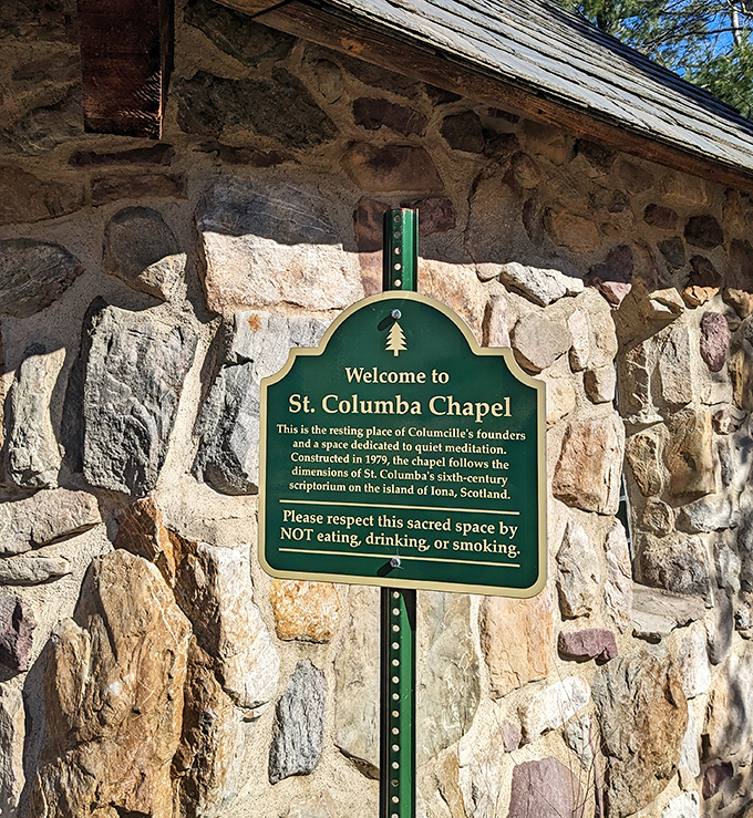 The sign reveals this chapel's connection to a 6th-century Scottish island. History lessons are always more interesting when delivered beside ancient-looking stones.