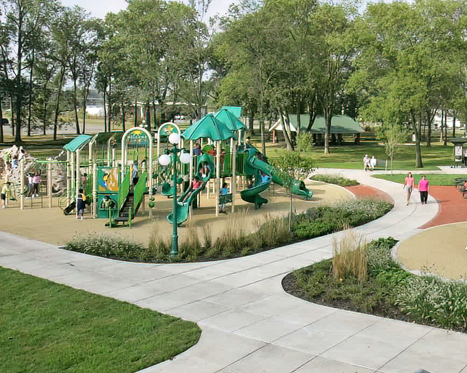 The community park provides recreation for all ages, where grandparents can watch grandchildren play without needing binoculars or a loan for admission.