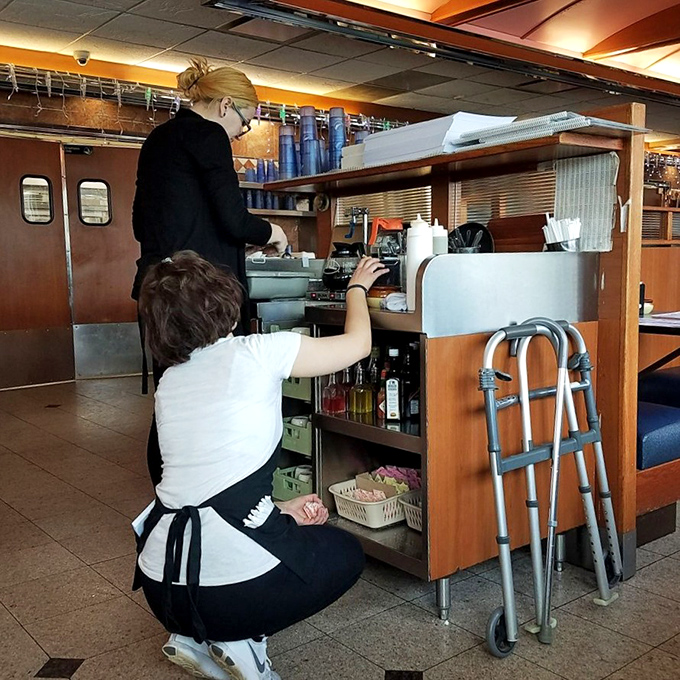 Behind every great diner is a staff that moves with the choreographed precision of people who know exactly what you need before you do.