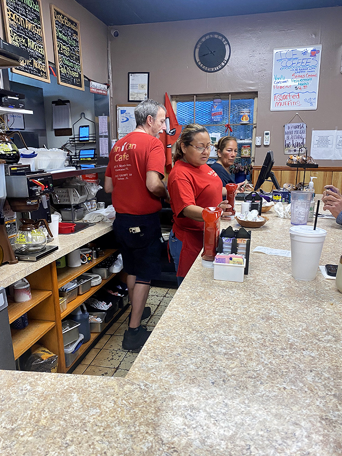 The kitchen crew in their element, orchestrating breakfast magic with the efficiency that comes only from genuine passion and experience.