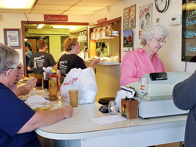 Where the magic happens &ndash; Stacy's staff in their element, turning simple ingredients into the comfort food that keeps people coming back for decades.