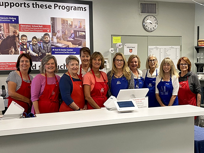 The volunteer dream team – the heart and soul behind the bargains. These smiling faces turn donations into community support with every transaction.