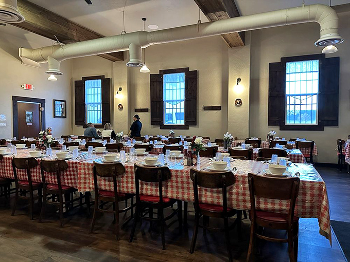 The dining room awaits its guests like a theater before the show &ndash; tables set, water glasses filled, and culinary magic about to begin.