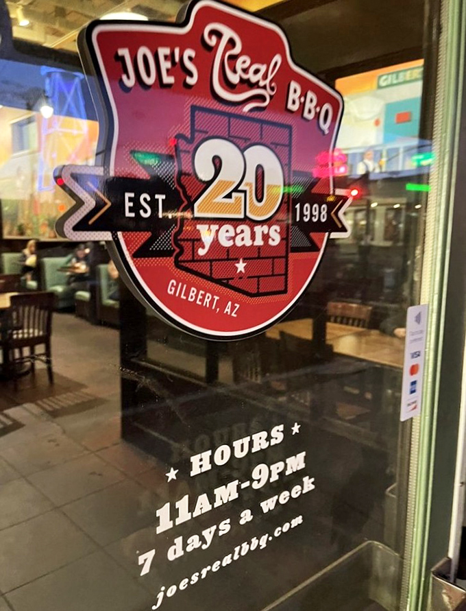 The window sign tells the story of longevity in a business where many flame out&mdash;over two decades of smoking meat is a testament to doing things right.