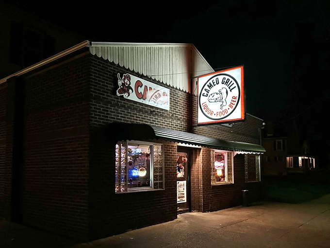 Evening glow transforms this neighborhood gem into a warm beacon of culinary comfort.