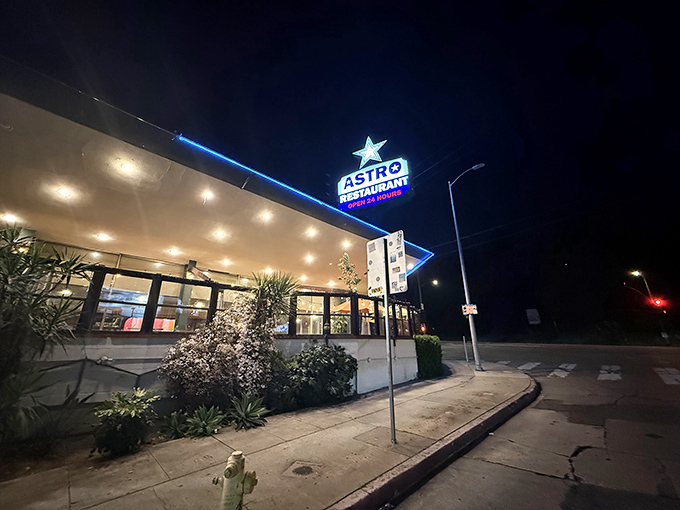 At night, Astro's neon glow becomes a lighthouse for the hungry, the sleepless, and everyone in between. Photo credit: What the fish sushi Since 2014