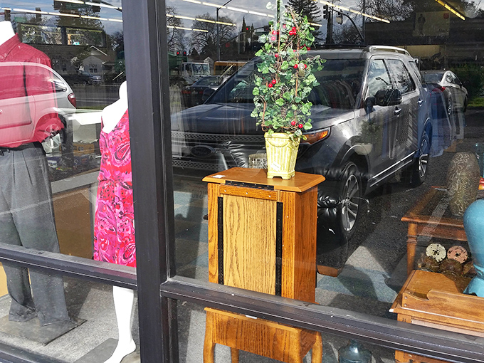 Window displays showcase the day's featured finds, tempting passersby with oak furniture and seasonal decor that whispers "potential."