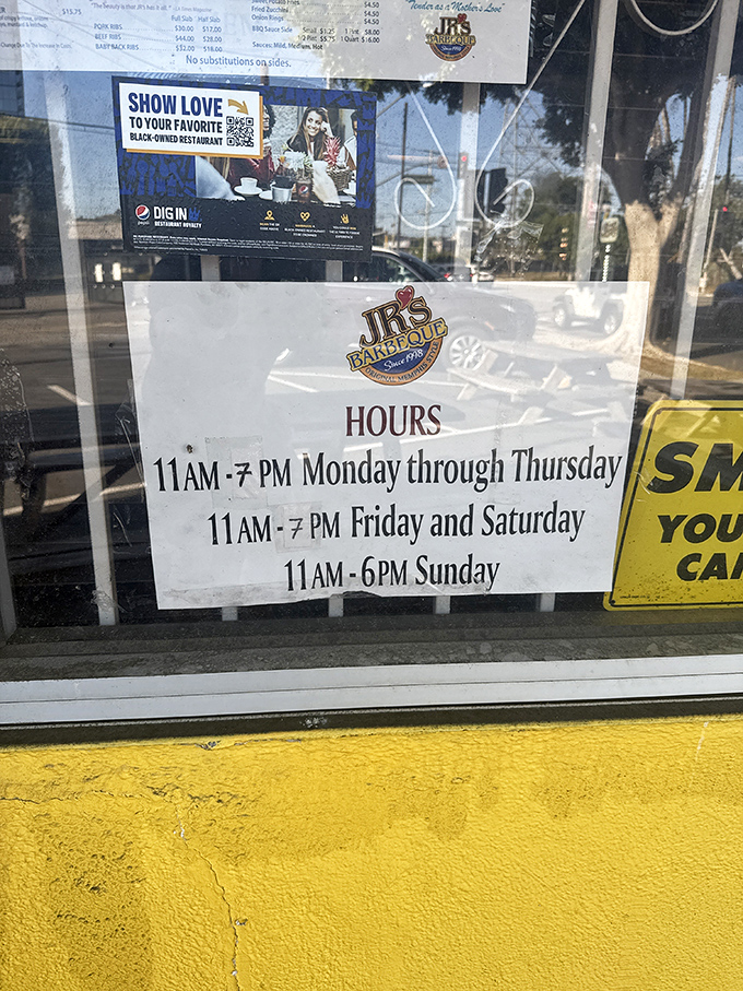 Business hours posted with the confidence of a place that knows you'll rearrange your schedule to get there before they close.