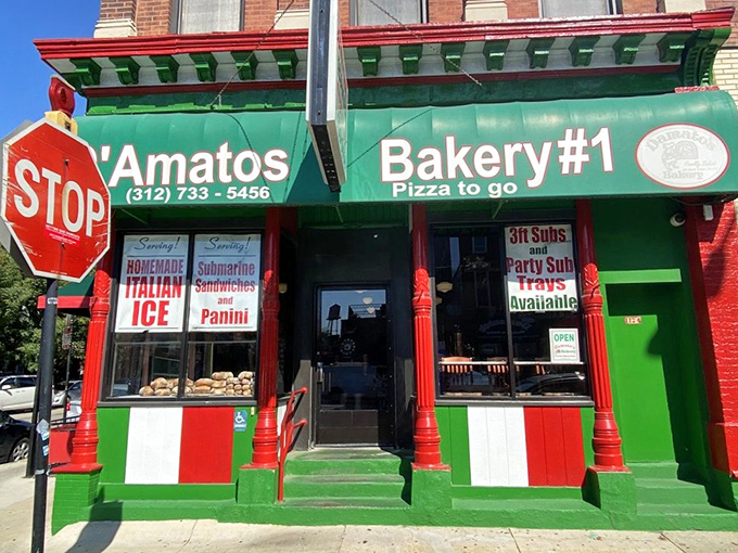 The red, white, and green storefront proudly announces its Italian heritage. This corner has been stopping traffic with aromas long before the sign appeared.