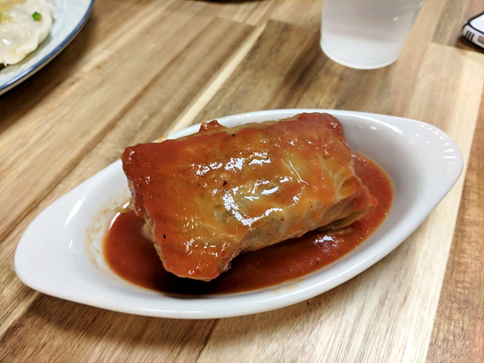 Stuffed cabbage isn't just dinner&mdash;it's a perfectly wrapped package of seasoned meat and rice, swimming in tomato sauce that's both tangy and sweet.