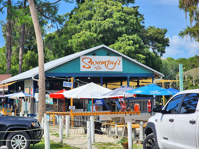 Swampy's Bar & Grille offers waterfront dining where the view rivals the menu and "fresh catch" isn't just marketing&mdash;it's geography.