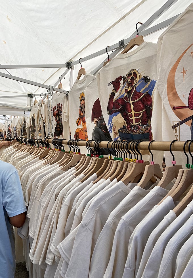 Wearable art hanging in perfect formation&mdash;these aren't just t-shirts, they're identity statements waiting to be adopted by the right torso.