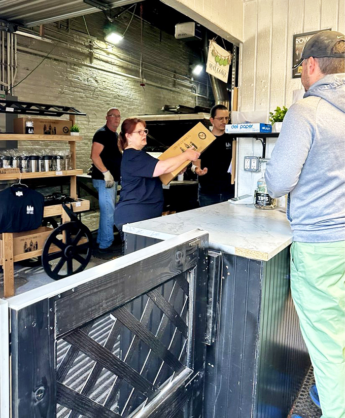 The pretzel handoff&mdash;a sacred transaction where dough transformed by fire and skill passes from artisan to appreciative customer. 