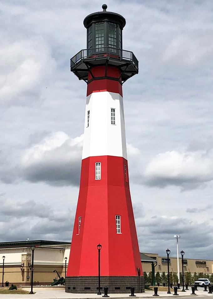 The lighthouse stands as both navigational beacon and metaphor &ndash; guiding lost shoppers back to their cars when shopping bags reach maximum capacity.