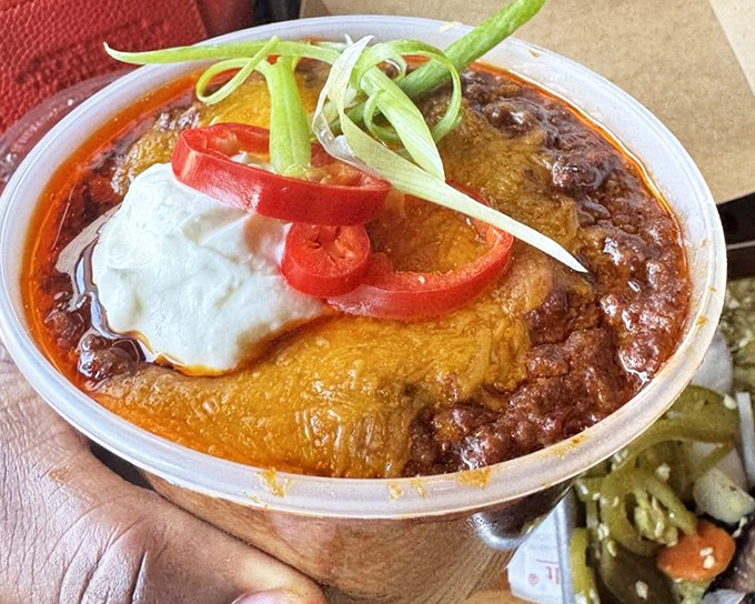 Texas chili that doesn't mess around. Rich, spicy, topped with cheese and sour cream &ndash; this is what winter afternoons were made for.