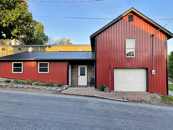 This red barn wasn't designed by an architect trying to capture "rustic chic"—it was built by people who needed somewhere practical to store things.
