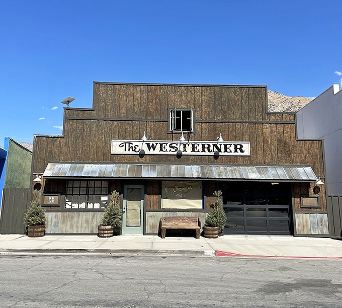 The Westerner's facade could convince you that Clint Eastwood might swing through those doors at any moment, squinting into the sun.