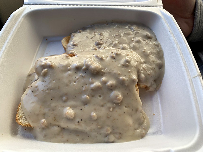 Toast and sausage gravy—the breakfast combination that makes you question why anyone bothered inventing eggs Benedict.