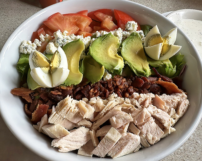 This Cobb salad demonstrates the art of thoughtful arrangement. Avocado, egg, bacon, and turkey in perfect harmony&mdash;like the Beatles of lunch.