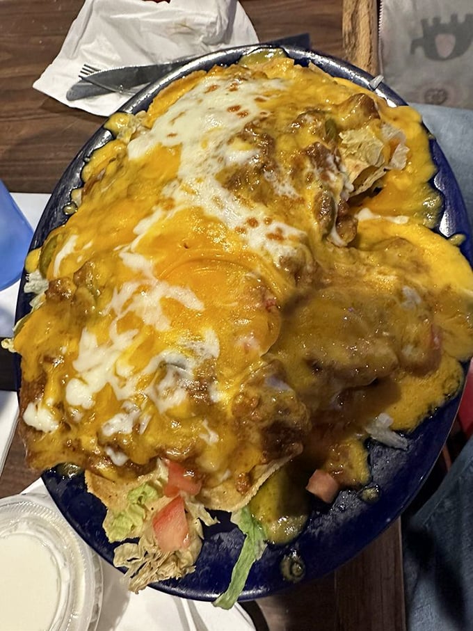 The Ultimate Nacho Fiesta isn't just a dish—it's an edible Jackson Pollock painting where cheese is the primary medium.