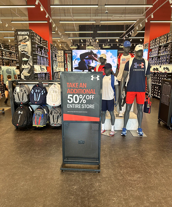 Under Armour's "additional 50% off" sign works like a tractor beam on fitness enthusiasts and deal hunters alike. Resistance is futile.