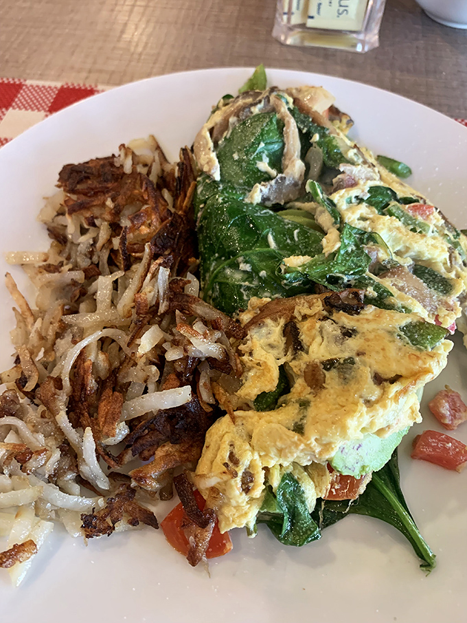 This veggie omelet with crispy hash browns proves that "healthy choice" and "absolutely delicious" aren't mutually exclusive concepts.