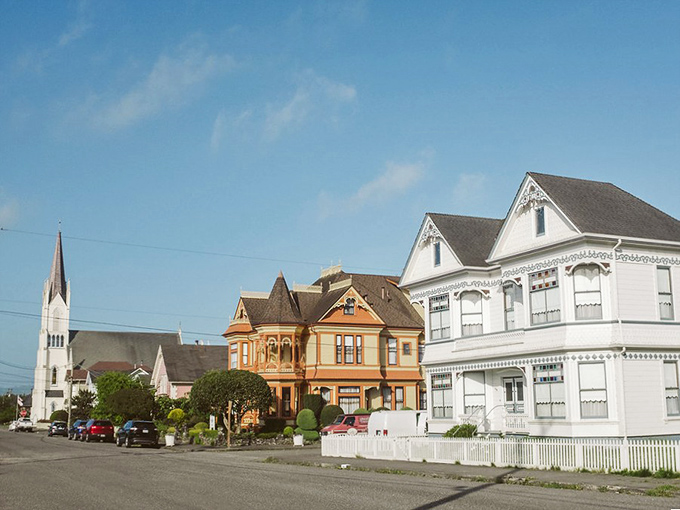 A row of impeccably maintained Victorians stands shoulder-to-shoulder, like architectural beauty contestants waiting for their crown of "Most Ornate Porch."