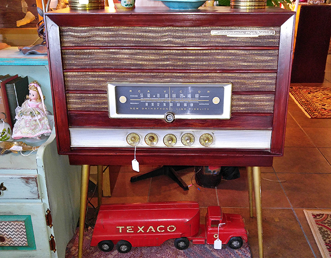 This vintage radio once gathered families around its warm glow, delivering everything from presidential addresses to The Shadow's mysterious adventures.