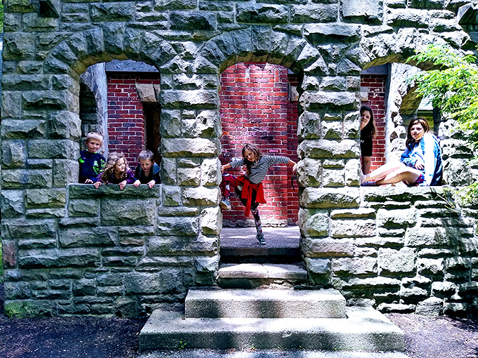 Kids instinctively know what to do with castle windows&mdash;strike a pose! These young explorers channel their inner royalty among the ancient-looking stones.
