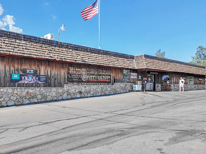 The Wagon Wheel Market embodies rustic California charm with its wooden facade. It's where "just picking up a few things" turns into conversations that span decades.