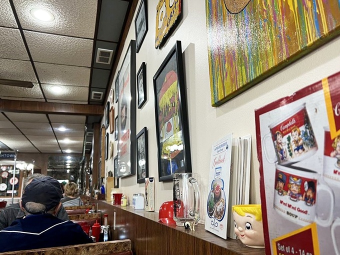 The exterior mural blends Philadelphia pride with artistic flair, announcing Sulimay's presence as both a neighborhood landmark and a celebration of local culture.