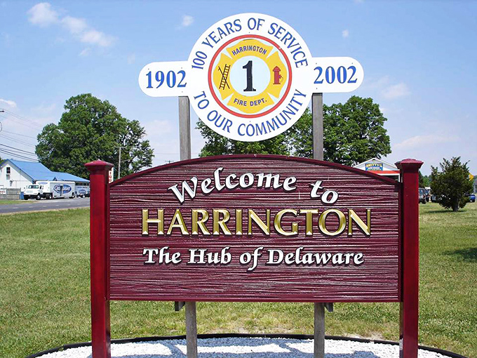 "The Hub of Delaware" proudly proclaims Harrington's welcome sign, celebrating over a century of community service and small-town pride.