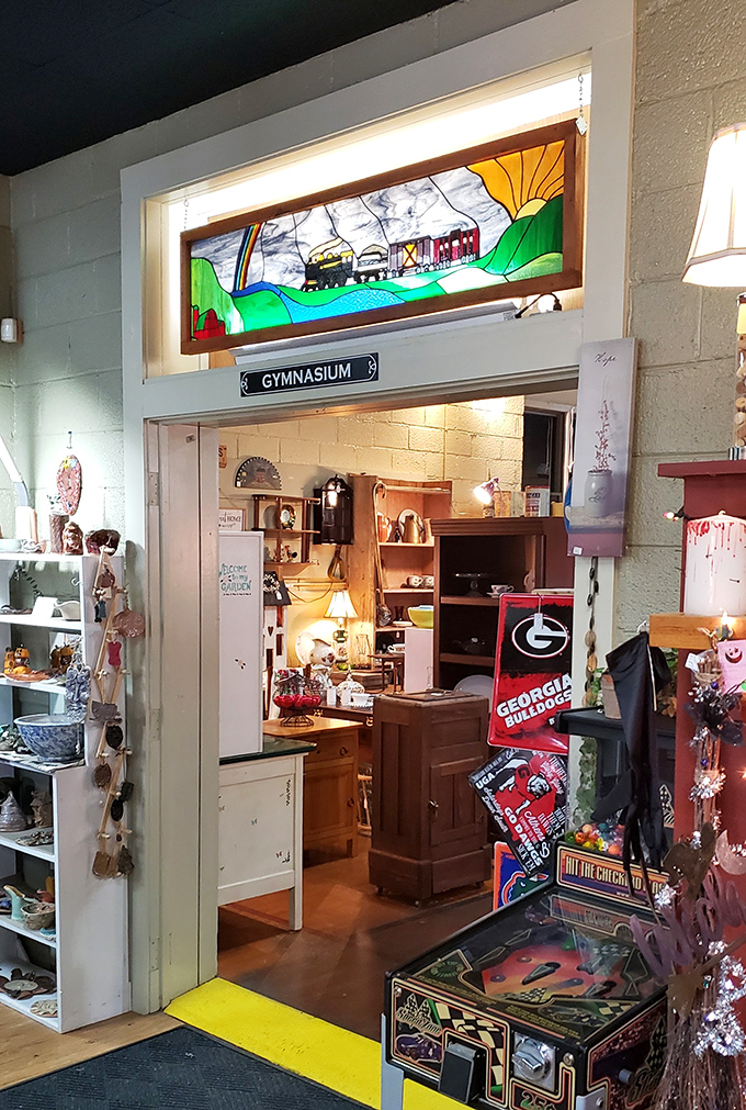 The "Gymnasium" entrance leads to yet another wonderland of collectibles. That stained glass train window above? Pure nostalgic brilliance.