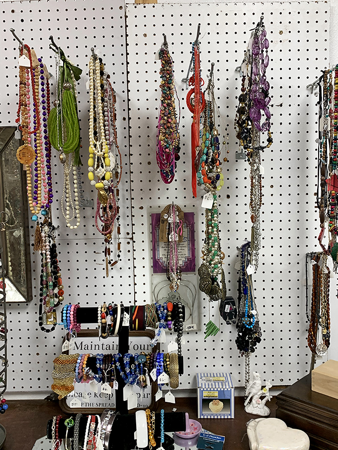 Jewelry galore! Colorful beads and vintage pendants dangle like wearable treasures, each with previous lives and new stories waiting to be written.