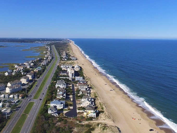 The slender barrier island from above reveals its precarious beauty&mdash;ocean on one side, bay on the other, humanity in between.