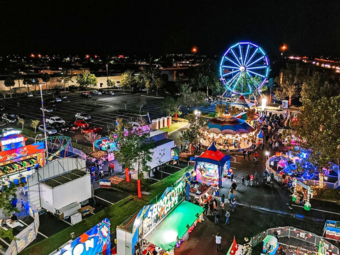 As night falls, the outlet transforms into a carnival wonderland, where Ferris wheels and food stands remind shoppers that retail therapy isn't the only joy in life.