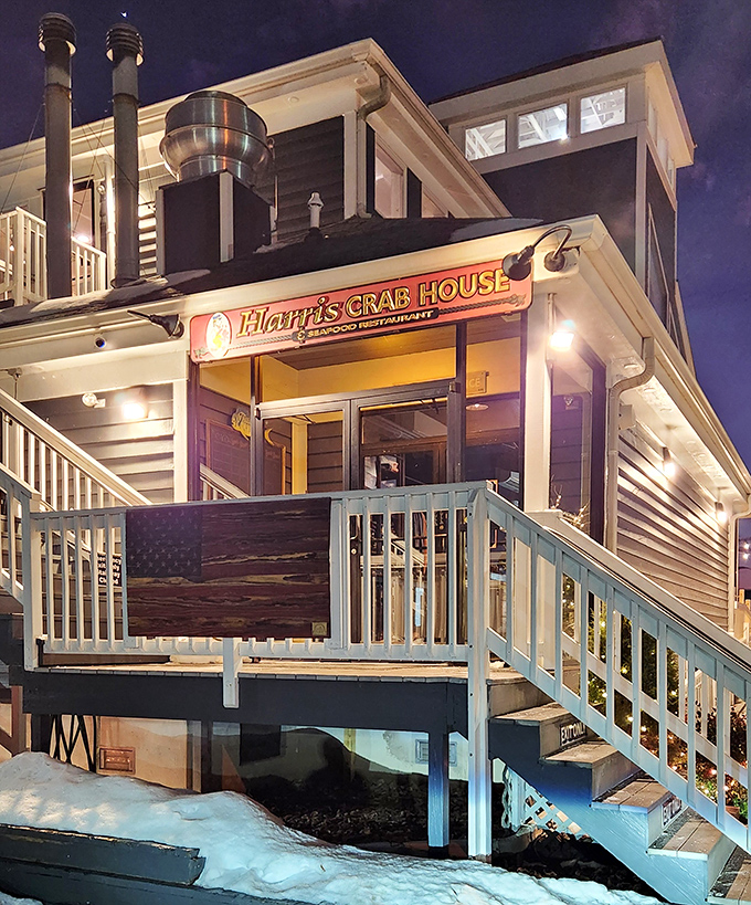 Harris Crab House at night becomes a glowing lighthouse for hungry souls. The stairway to seafood heaven is well-lit and welcoming.
